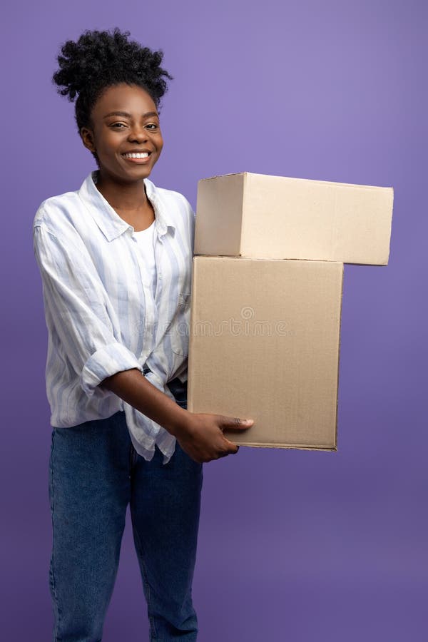 Smiling Good-looking Dark-skinned Girl with Boxes in Studio Stock Image ...