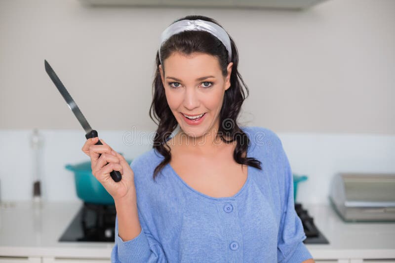 Smiling Gorgeous Model Holding Knife Stock Image - Image of brunette ...