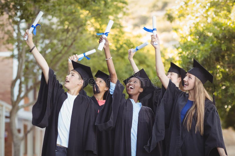 Smiling Graduate School Kids Standing with Degree Scroll in Campus ...