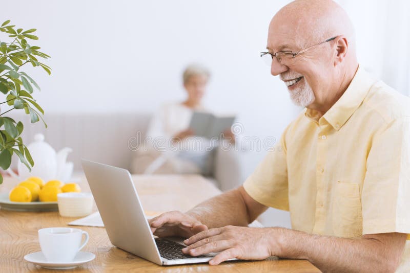 Smiling Grandfather Using Laptop Stock Image - Image of communication ...