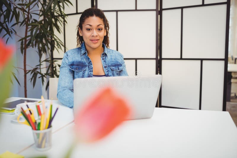 Smiling Graphic Designer at Desk with Laptop Stock Photo - Image of ...