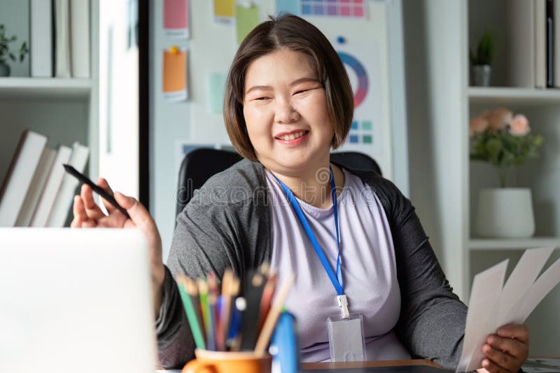 Smiling Graphic Designer Presenting Design Ideas in a Creative ...