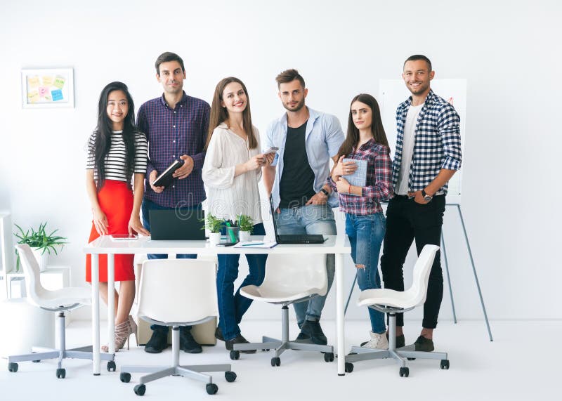 Smiling Group of Business People in the Office Stock Image - Image of ...