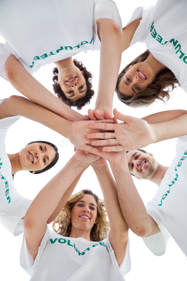 Smiling Group Of Volunteers Standing Stock Photo - Image of hair, adult ...