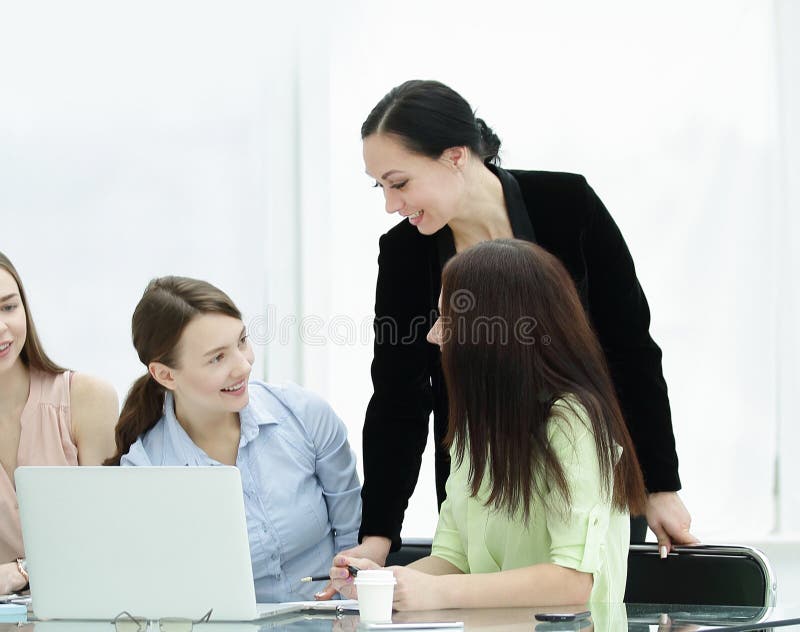 Smiling Group of Women Behind a Desk in the Office Stock Image - Image ...