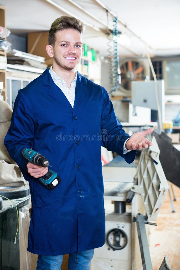 Smiling Guy Carpenter Working with Professional Drill Stock Image ...
