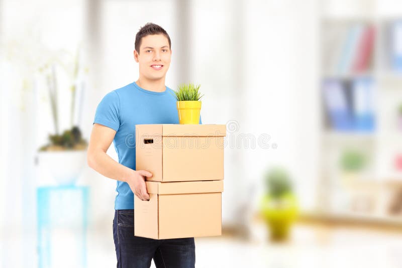 Smiling Guy Carrying Removal Boxes during Moving Stock Image - Image of ...