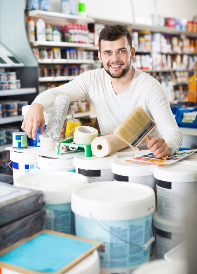 Smiling Guy Demonstrating Tools for House Renovating Stock Image ...