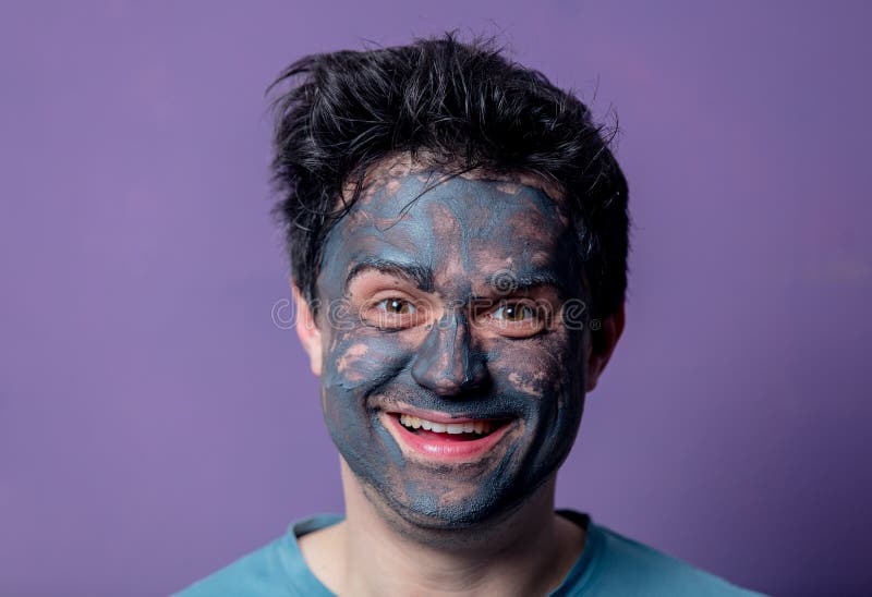 Smiling Guy in a Face Care Mask Stock Image - Image of adult, mask ...