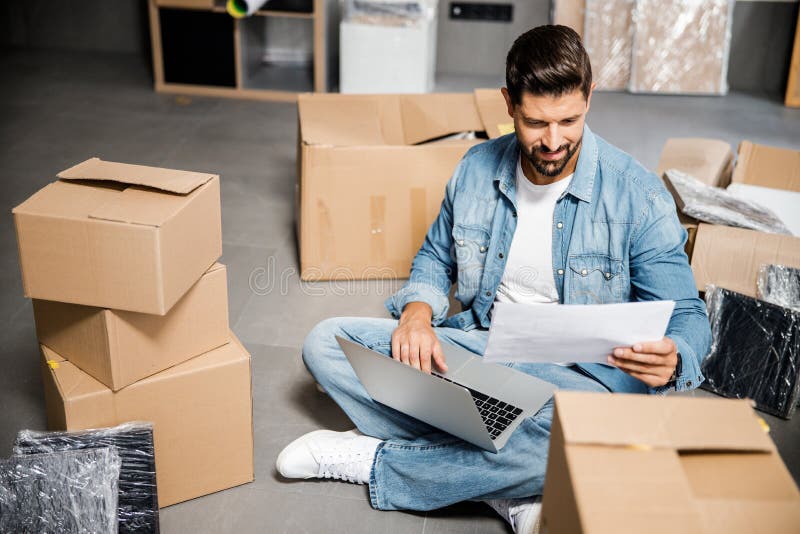 Smiling Guy with Laptop Discovering New Apartment Stock Image - Image ...
