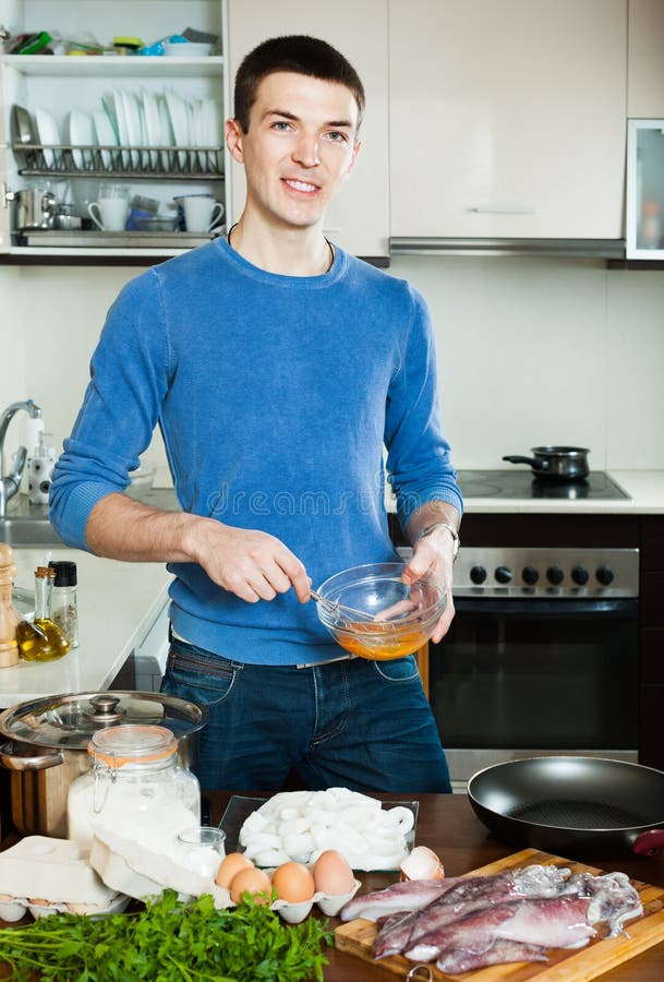 Smiling Guy Preparing Batter Stock Image - Image of squid, interior ...