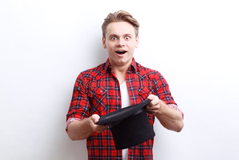 Smiling Guy Standing with Hat Stock Photo - Image of delight, handsome ...