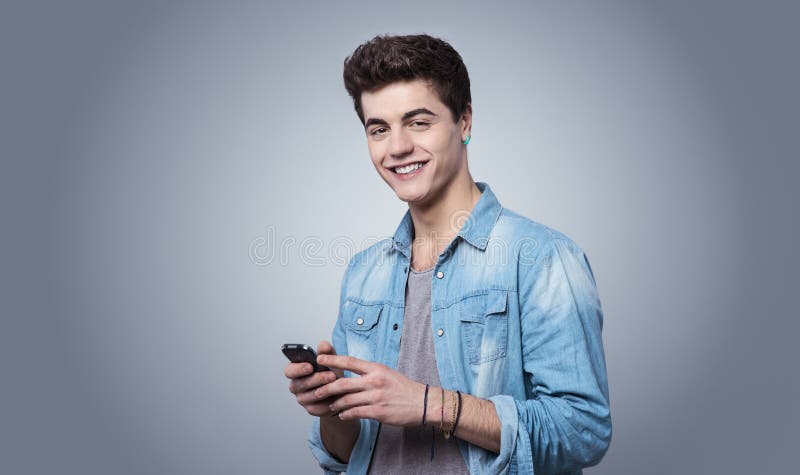 Smiling Guy Texting with Smartphone Stock Image - Image of social ...