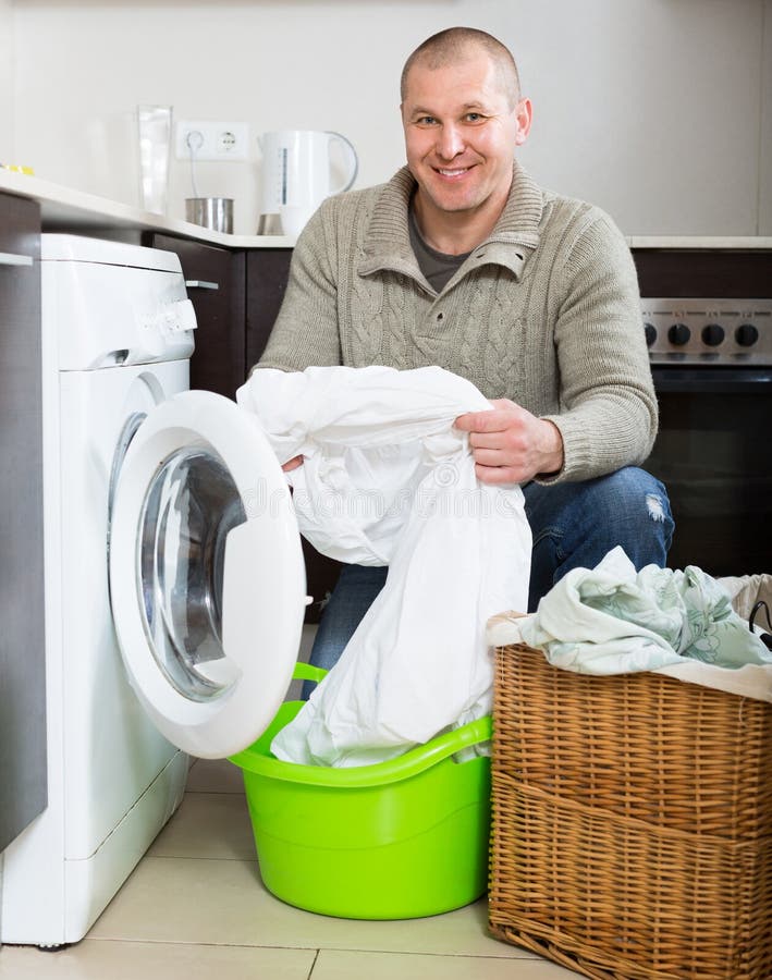 Smiling Guy Using Washing Machine Stock Image - Image of appliance ...
