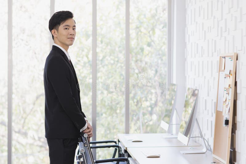 Asian Businessman Standing and Posing in Office Stock Image - Image of ... Asian Businessman Standing and Posing in Office Stock Image - Image of ...