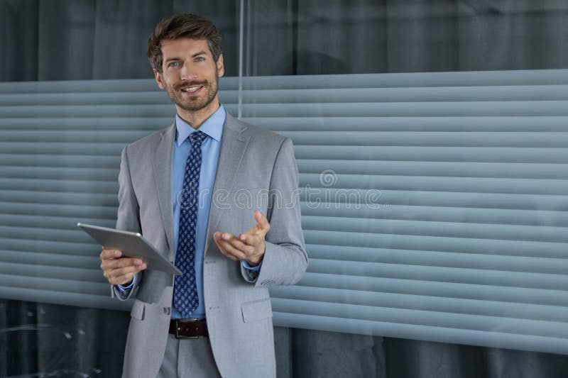 Smiling Handsome Businessman Manager Standing in Office with Tablet ...