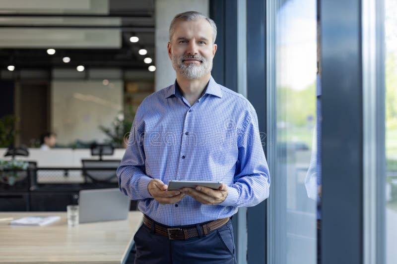 Smiling Handsome Businessman Manager Standing in Office with Tablet ...
