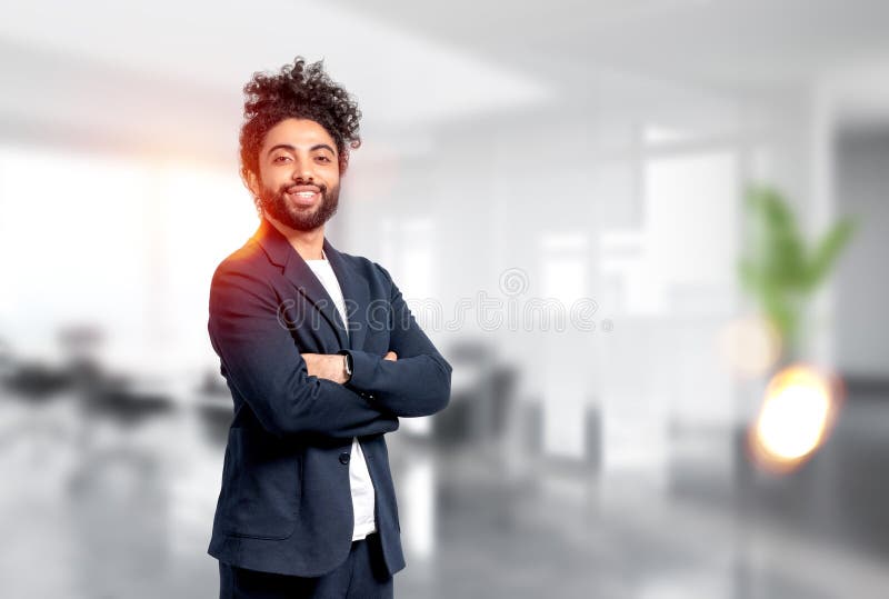 Smiling Handsome Businessman is Standing in Crossed Arms Pose Stock ... Smiling Handsome Businessman is Standing in Crossed Arms Pose Stock ...