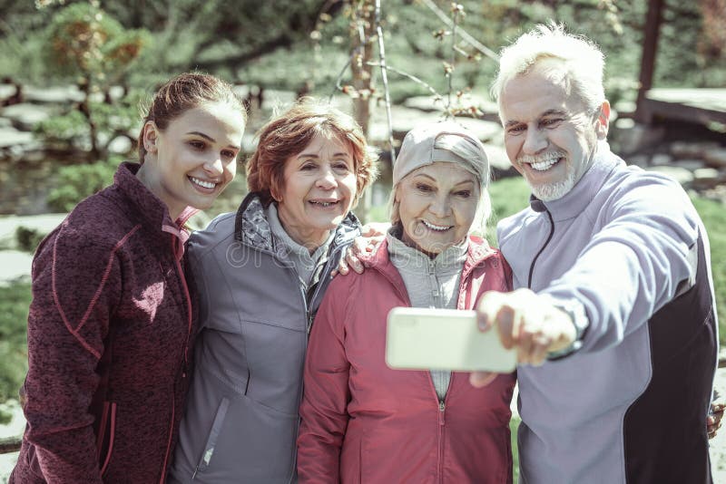 Smiling Handsome Man Doing Selfie with Mates Stock Image - Image of ...