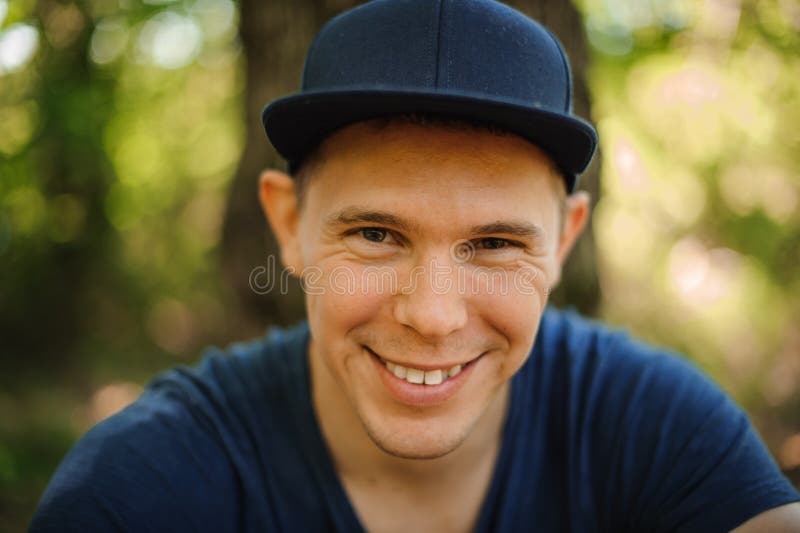 Smiling Handsome Young Man Wearing Cap Stock Image - Image of people ...