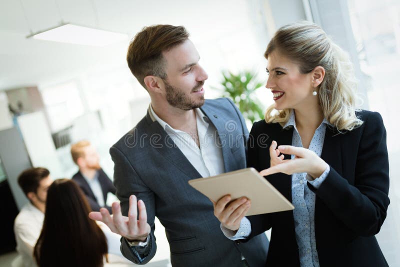 Smiling Happy Colleagues Working at Company Stock Photo - Image of ...
