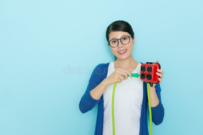 Smiling Happy Woman Using Plug Pull Out Socket Stock Photo - Image of ...