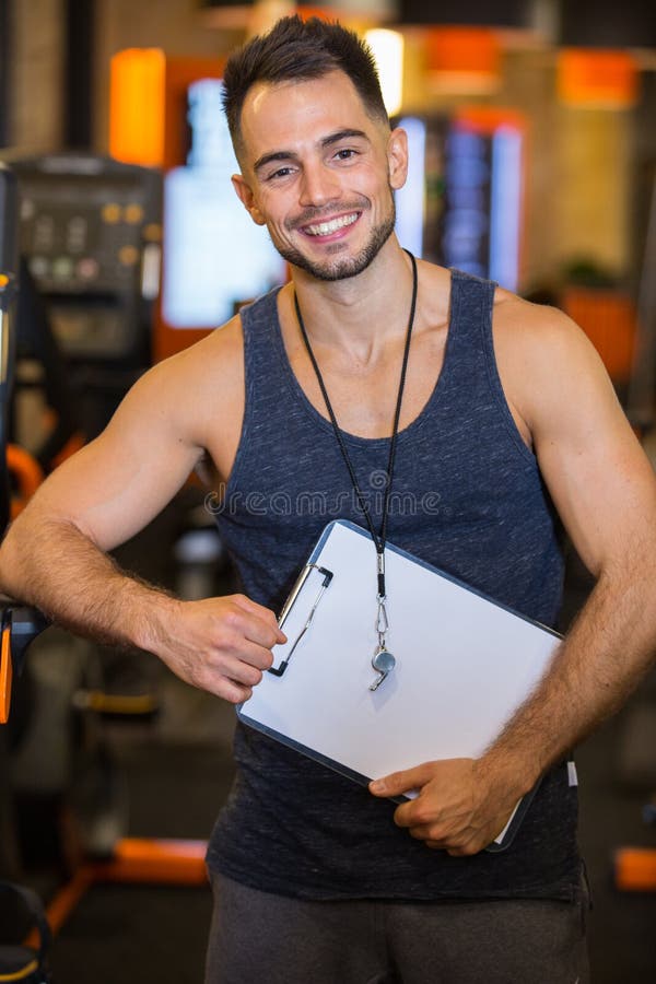 Smiling and Happy Young Coach Man Training in Gym Stock Image - Image ...