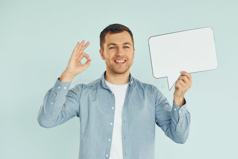 Smiling and Having Good Mood. Man Standing in the Studio with Empty ...