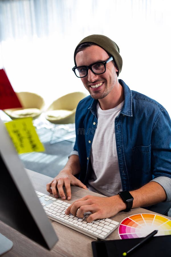 Smiling Hipster Man Working At Computer Desk Stock Image Image Of