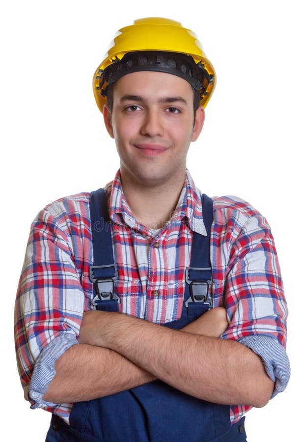 A Smiling Hispanic Male Construction Worker Standing in Construction ...
