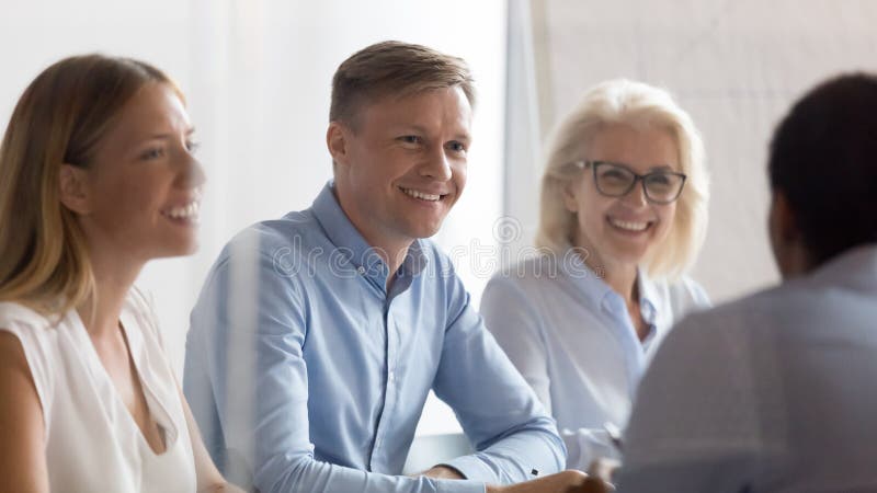 Smiling Hr Group Looking at Candidate Talking at Job Interview Stock ...