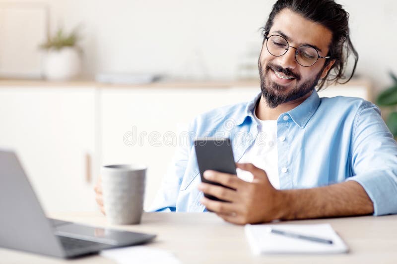 Smiling Indian Employee Relaxing Smartphone Coffee Office Stock Photos ...