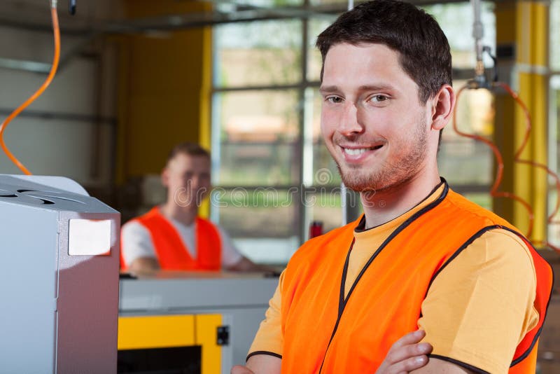 Smiling factory worker stock image. Image of boxes, plans - 39101089