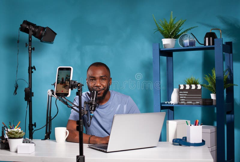 Smiling Influencer Interacting with Audience in Front of Recording ...