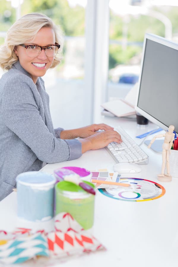 Smiling Interior Designer Working on Her Computer Stock Photo - Image ...
