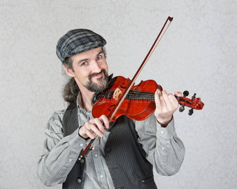 Smiling Irish Fiddler Performing Stock Image - Image of fiddler, single ...