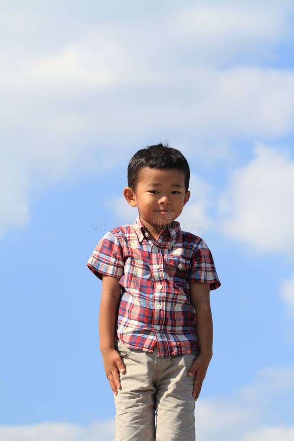Smiling Japanese Boy Under the Blue Sky Stock Image - Image of blue ...