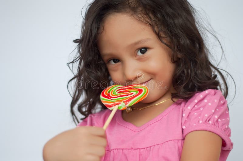 Smiling kid with candy stock photo. Image of smile, girl - 13925182