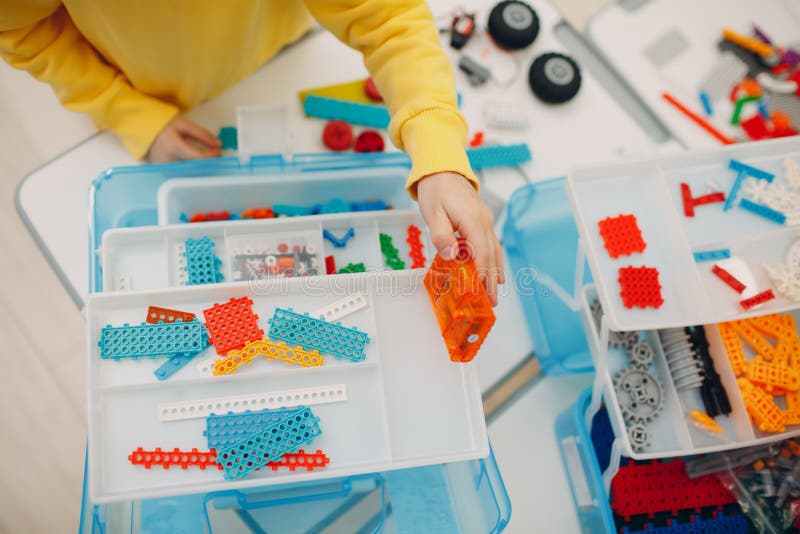 Smiling Kid Child Constructor Checking Technical Toy. Children Robotics ...