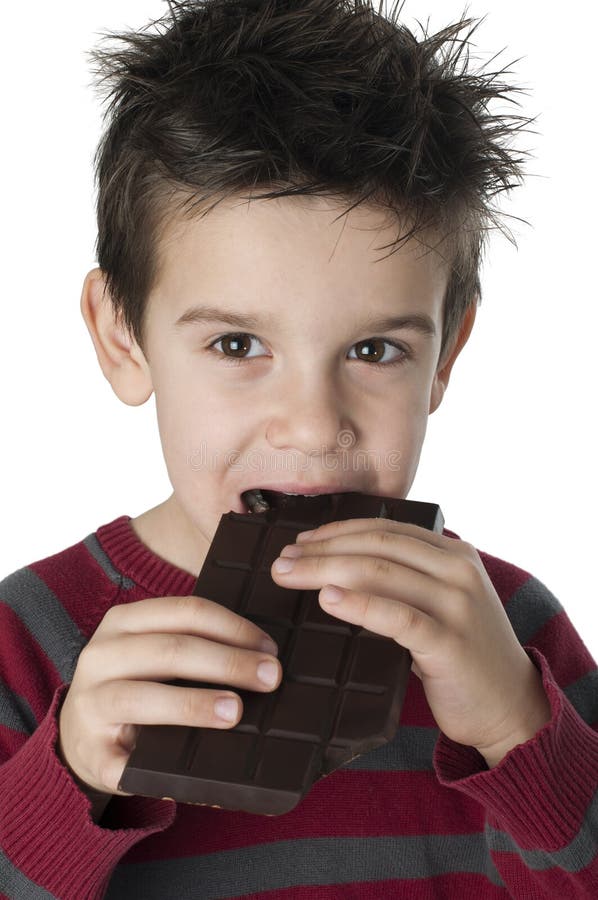 Smiling Kid Eating Chocolate Stock Photo - Image of face, chopped: 28144048