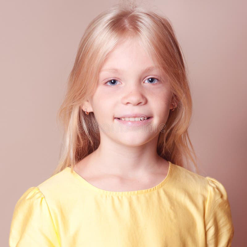 Smiling Kid Girl Posing on Beige Stock Image - Image of hair ...