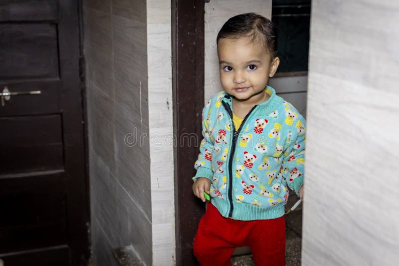 Smiling Kid Innocent Facial Expression at Indoor at Night Stock Photo ...