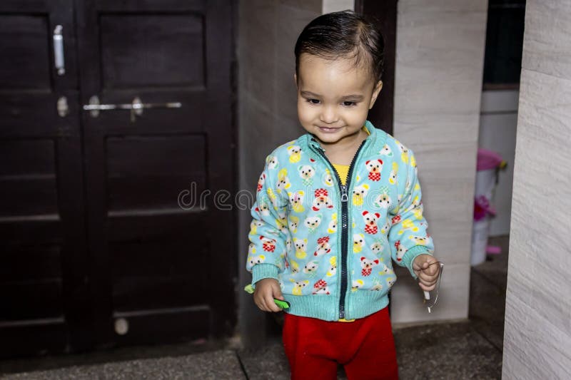 Smiling Kid Innocent Facial Expression at Indoor at Night Stock Photo ...