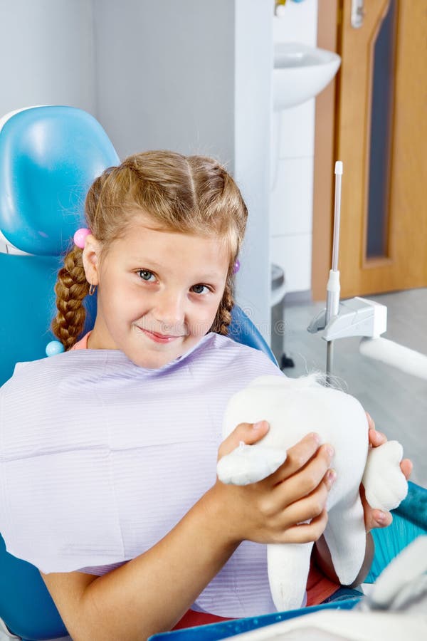 Kid with a toy tooth stock photo. Image of regular, elementary - 29939474