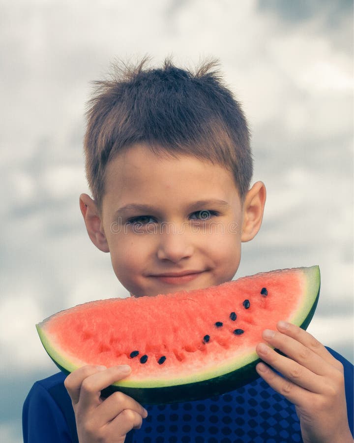 Smiling Kid with Watermelon Against Blue Sky Stock Image - Image of ...