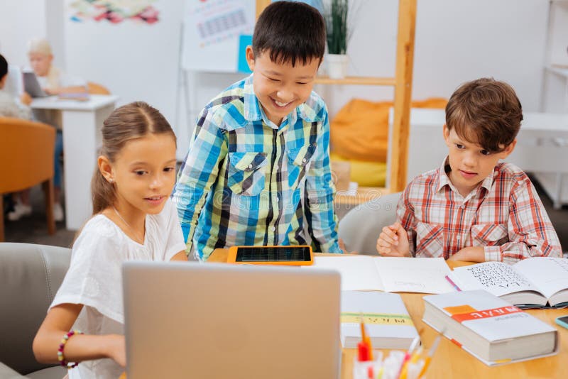 Smiling Kids Looking for the Information on the Internet Stock Image ...
