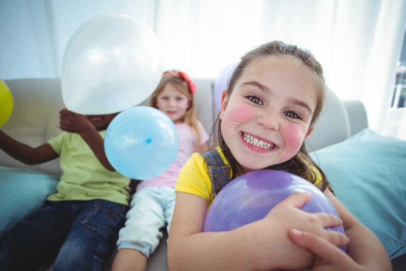 Smiling Kids Playing with Balloons Stock Photo - Image of cheerful ...