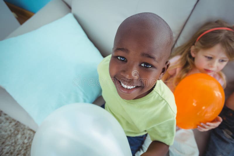 Smiling Kids Playing with Balloons Stock Photo - Image of closeup, high ...