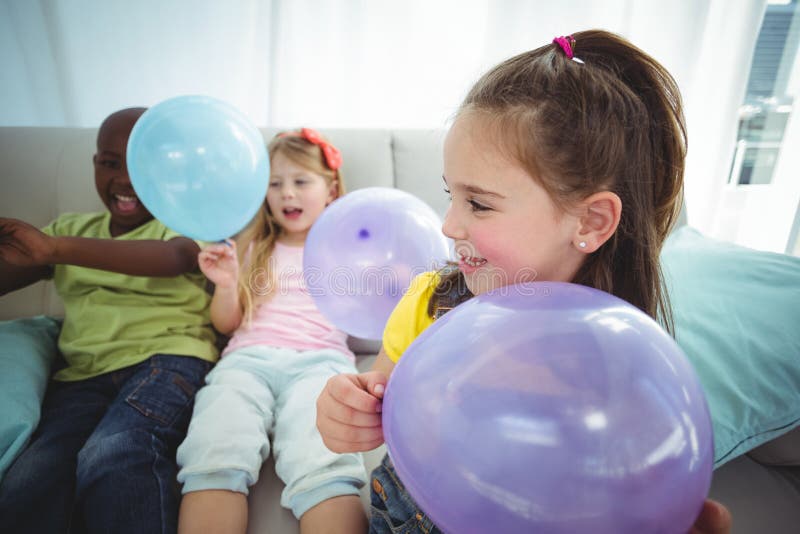 Smiling Kids Playing with Balloons Stock Image - Image of happy ...