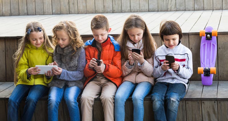 Three Children Talking on Kids Mobile Phone Stock Image - Image of ...